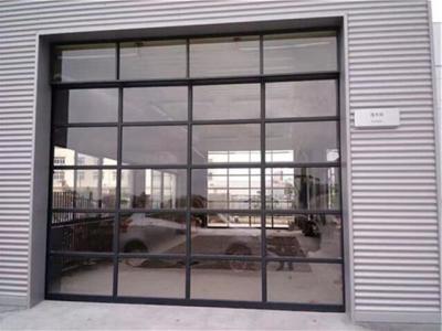 China 5m Width Insulated Glass Sectional Garage Doors for sale