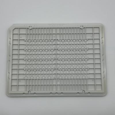 China Flexible Customized Tray  Pocket Size 25.7*6.4*0.41mm Chip Tray White ABS Semiconductor Chip Loading Tray for sale