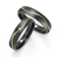 China Trend Round Black Titanium Ring With IP Gold Line Inset Zircon Couples Ring for sale