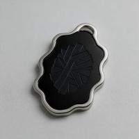 China Fashionable men's pendant,a collision of metal and black,with neat lines,highlighting a tough style,and a great choice for trendy accessories for sale