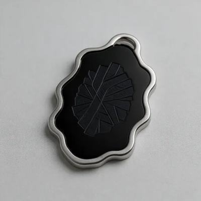 China Fashionable men's pendant,a collision of metal and black,with neat lines,highlighting a tough style,and a great choice for trendy accessories for sale