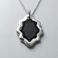 China Men's Geometric Pendant:Sleek metal+matte black,elevates casual looks for sale
