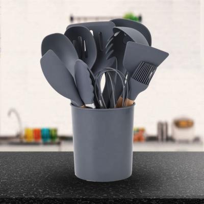 China Experience the Best Cooking with Silicone Kitchen Utensils Set and Wooden Handle for sale