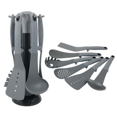 China Kitchen Accessories with Rotating Stand and Nylon ABS Handle Nonstick Cooking Utensil for sale