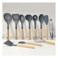 China 7-Piece Utensil Sets with Wooden Handle and Hanging Hole Heat Resistant up to 240C for sale