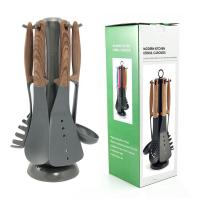 China ISO9001 Certified Non-stick Cookware Set with Wooden Finish Handle and Kitchen Utensils for sale