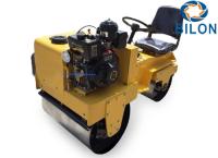 China 6HP 700kg Ride On Vibratory Road Roller Double Drum 15L Water Tank for sale
