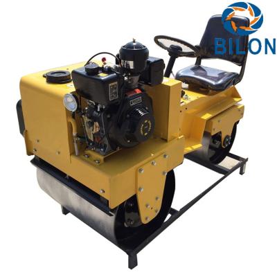 China 6HP 700kg Ride On Vibratory Road Roller Double Drum 15L Water Tank for sale