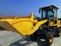 China 0.6m3 1500kg 2850mm Unloading Height Small Wheel Loader with Hydraulic System for sale