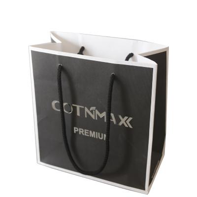 China Recycled Handmade Paper Bags Jewelry Packaging Kraft Paper Shopping Bag With Handle for sale
