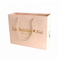 China Recycled Cardboard Custom Luxury Paper Gift Bags And Boxes With Ribbon Handle for sale
