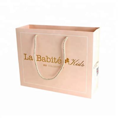 China Recycled Cardboard Custom Luxury Paper Gift Bags And Boxes With Ribbon Handle for sale