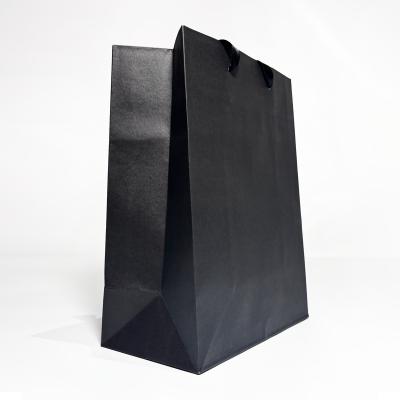 China Custom Handmade Kraft Paper Bag for Clothing Shopping Luxury Handle Ribbon for Retail Packaging for sale