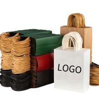 China Eco-Friendly Customized Logo Printing Shopping Packaging White Craft Paper Bags With Handles for sale