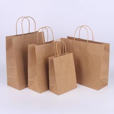 China Recyclable Custom Logo Brown Kraft Paper Bag  Custom Shopping Handle Kraft Paper Bag With Logo for sale