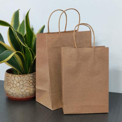 China Custom Kraft Paper Bags With Brown Hand Length Handle Recyclable Takeaway Paper Bags for sale