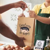 China Customizable Brown Cowhide Kraft Paper Takeaway Bag Free Logo Design And Printing for sale