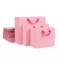 China Custom Brand Logo Luxury Paper Gift Bag Recyclable Gift Bags Handle Paper Packaging Bags Ribbon Handle for sale
