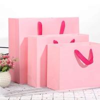 China Custom Luxury Paper Gift Bag Recyclable Gift Bags Handle Paper Packaging Bags for sale