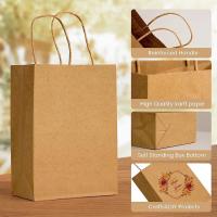 China Customized Kraft Paper Bags Khaki With Logos For Clothing For Gift Shopping And Promotion for sale