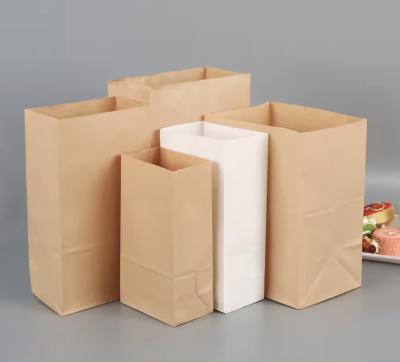China Fat-proof kraft paper bag, with handles, eco-friendly square bottom for fast food packaging, used for jelly takeout for sale