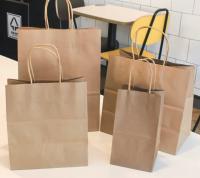 China Wholesale free samples, thick kraft paper bags with custom logo printing, high-quality shopping gift paper bags, twisted handle packaging bags for sale
