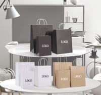 China Environmentally Friendly Reusable Brown Kraft Paper Luxury Tote Bag With Twisted Handle for sale