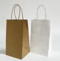 China Customized eco-friendly kraft paper tote bag with twisted handles, suitable for shopping for sale