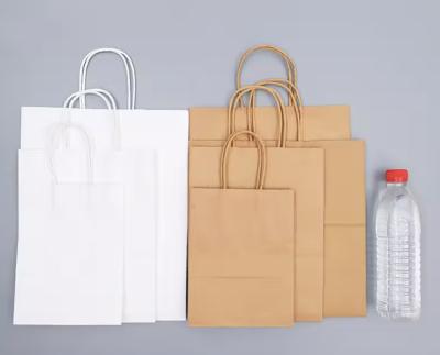 China Wholesale brown kraft paper bags accept custom printing, including inventory gift bags, fast food take-away bags, twisted handle shopping bags for sale