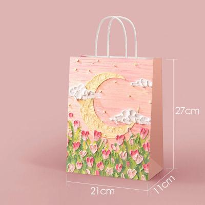 China Color Painting Flower Kraft Paper Twisted Handle Gift Shopping Carrier Bag With Logo Printed Kraft Paper Bag for sale