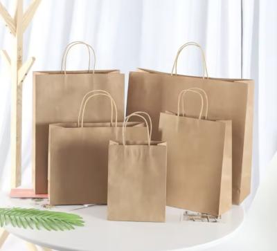 China Recycling Custom-Made Color-Printed Shopping Kraft Paper Bags With Twisted Paper Handles for sale