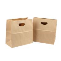 China Eco Friendly Customized Logo Size Food Clothing Packaging Fast Food Takeaway Kraft Paper Bag With Die Cut Handle for sale
