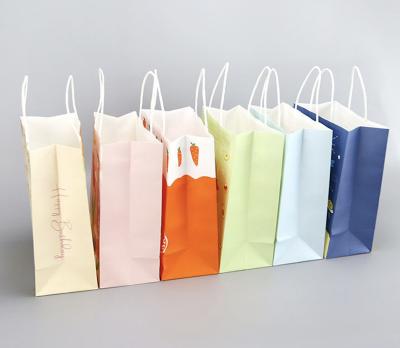 China Luxury Recyclable Kraft Paper Gift Bags Gold Foil Stamping Embossing Twisted Handle CMYK Printing For Crafts Gravure Printing for sale
