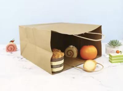 China Best-selling low-priced food-grade brown kraft paper twisted flat-handle kraft paper shopping bags for sale for sale