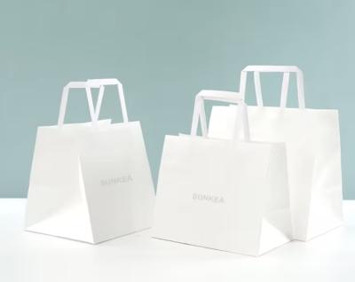 China Wholesale environmentally friendly recyclable takeout flat brown handle kraft paper grocery custom paper bag with handle for sale