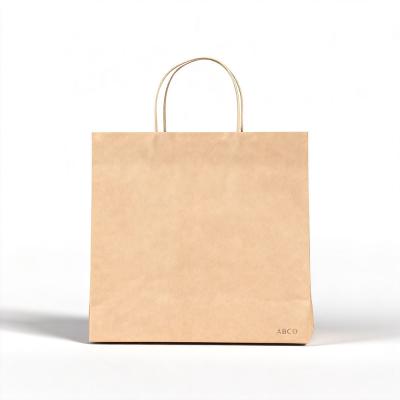 China Custom Retail Grocery Birthday Wedding Party Natural Recycled Twiststring Handle Blank Paper Shopping Bags for sale