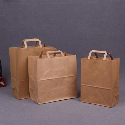 China Custom Package Clothing Printed Pink Portable Paper Packaging Bags Customized Flat Handle White Kraft Paper Bags With Your Logo for sale