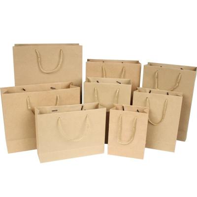 China Logo-Printed Biodegradable Kraft Paper Bag Disposable With Handles For Camping for sale