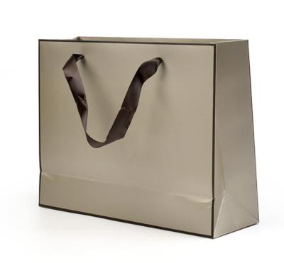 China Custom Logo Jewelry Bag For Counter Shopping Bag With Handle Coated Paper Bag for sale