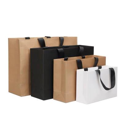 China Paper Bag Custom Printed Logo Luxury Clothing Shopping Paper Bags Boutique Recyclable Gift Bag With Ribbon Rope Handles for sale