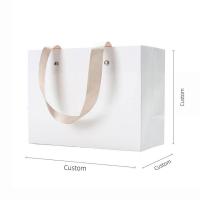 China Custom Printed Eco-Friendly Durable Waterproof Luxury Brand Logo Gift Shopping Paper Bags For Shoes & Clothing for sale