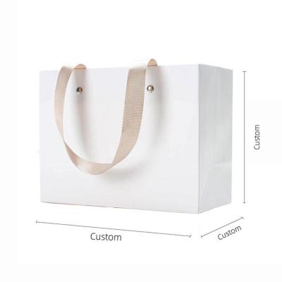 China Custom Printed Eco-Friendly Durable Waterproof Luxury Brand Logo Gift Shopping Paper Bags For Shoes & Clothing for sale