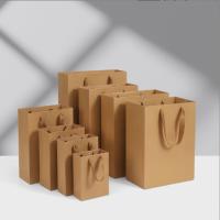 China Gift Paper Bag Custom Packaging Paper Bags Clothing Cardboard Shopping Kraft Carrier Bag for sale