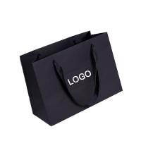 China Bulk Luxury Boutique Gift Paperboard Bags With Ribbon Handles Black And Gold Frame For Supermarket Packaging for sale