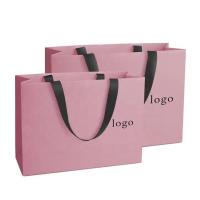 China White Cardboard Gift Customized Logo Garment Paper Bags For Clothes for sale