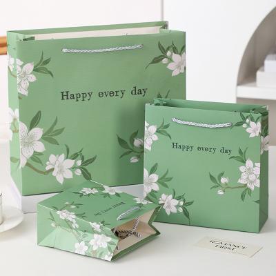 China Luxury Eco-Friendly Recycled Materials White Cardboard Gift Bags-Reusable-Reinforced Handles-Wedding & Birthday Packaging for sale