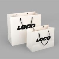 China Custom Printed Luxury Art Paper Shopping Bags With Handle Handmade Packaging For Clothes For Supermarket Use for sale