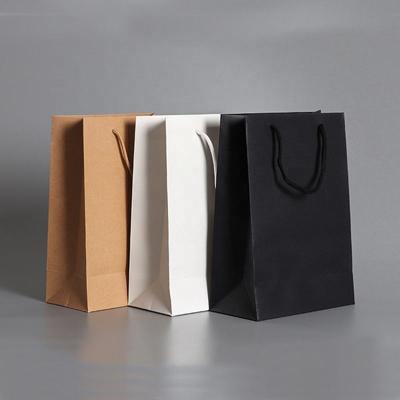 China Luxury Pink Premium Kraft Paperboard Shopping Bags With Custom Logo Ribbon Accessory For Shoes And Clothing Gift Giving for sale