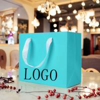 China Custom Logo Luxury Ribbon Handle Green Kraft Paper Shopping Bags With Cotton For Boutique Packaging With Personalized Crafts for sale