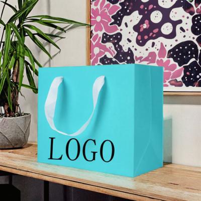 China Paper Bags Custom Made Accessory Cotton Paper Ribbon Handle Embossing Full Print Paper Bags With Your Own Logo for sale
